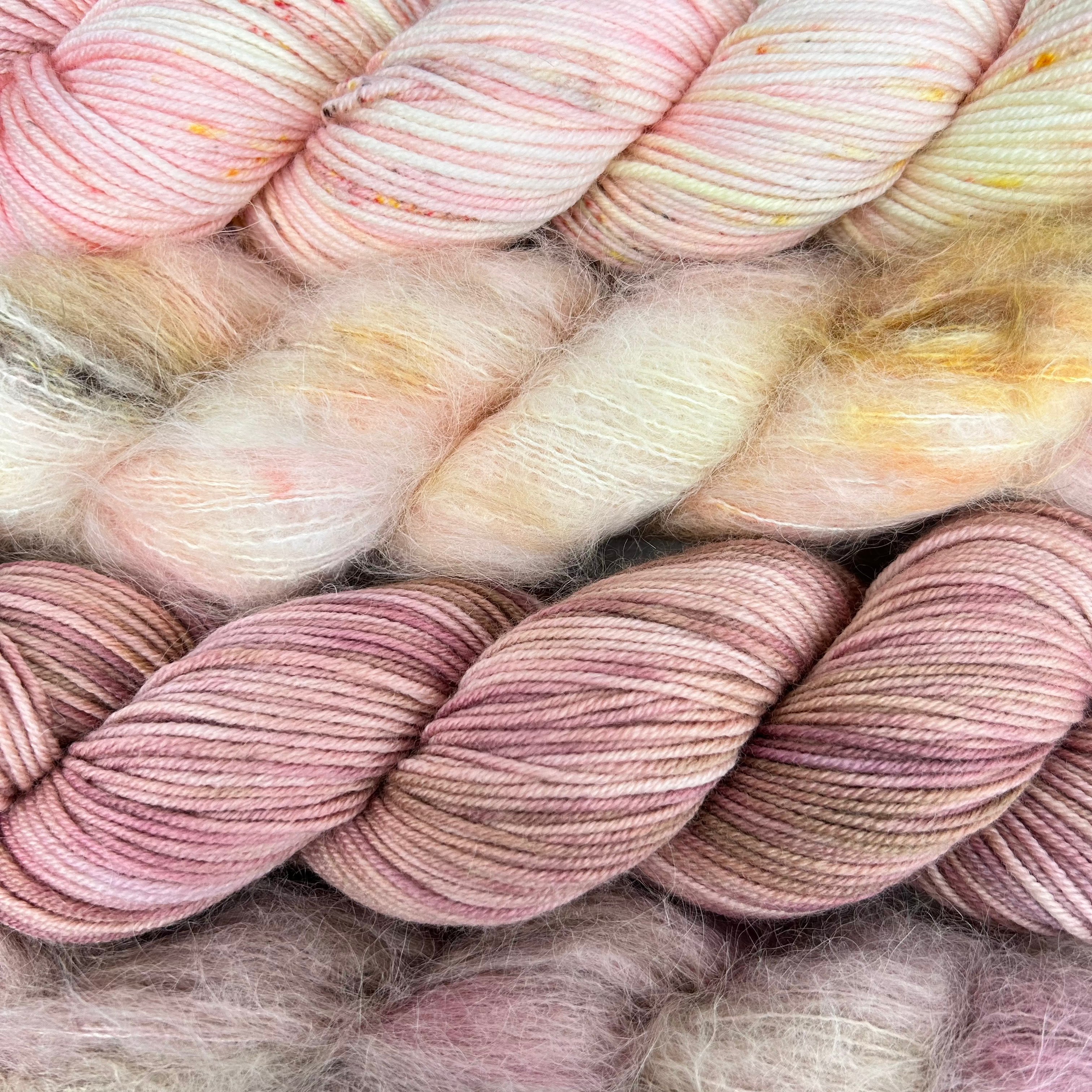Thoughtfully curated Fiber MacGyver hand-dyed yarn bundles
